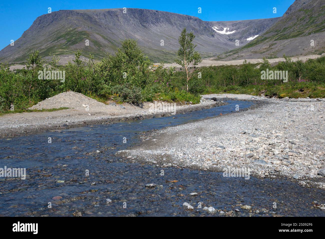 The mountain river, also known as the highway, Khibiny, Murmansk region ...