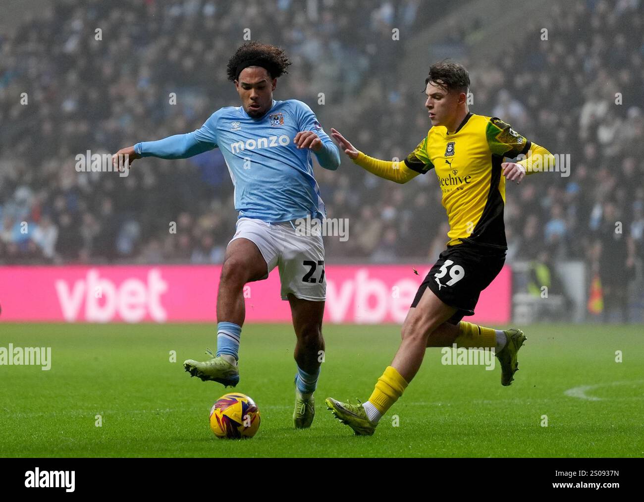 Coventry City's Milan van Ewijk (left) and Plymouth Argyle's Tegan Finn ...