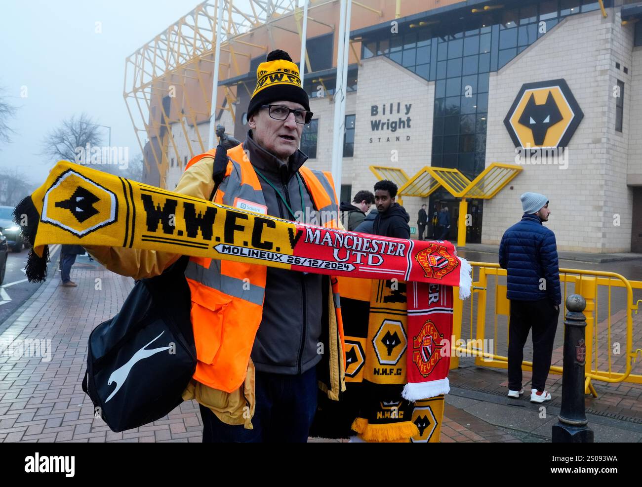 A street vendor selling scarves outside the ground ahead of the Premier ...