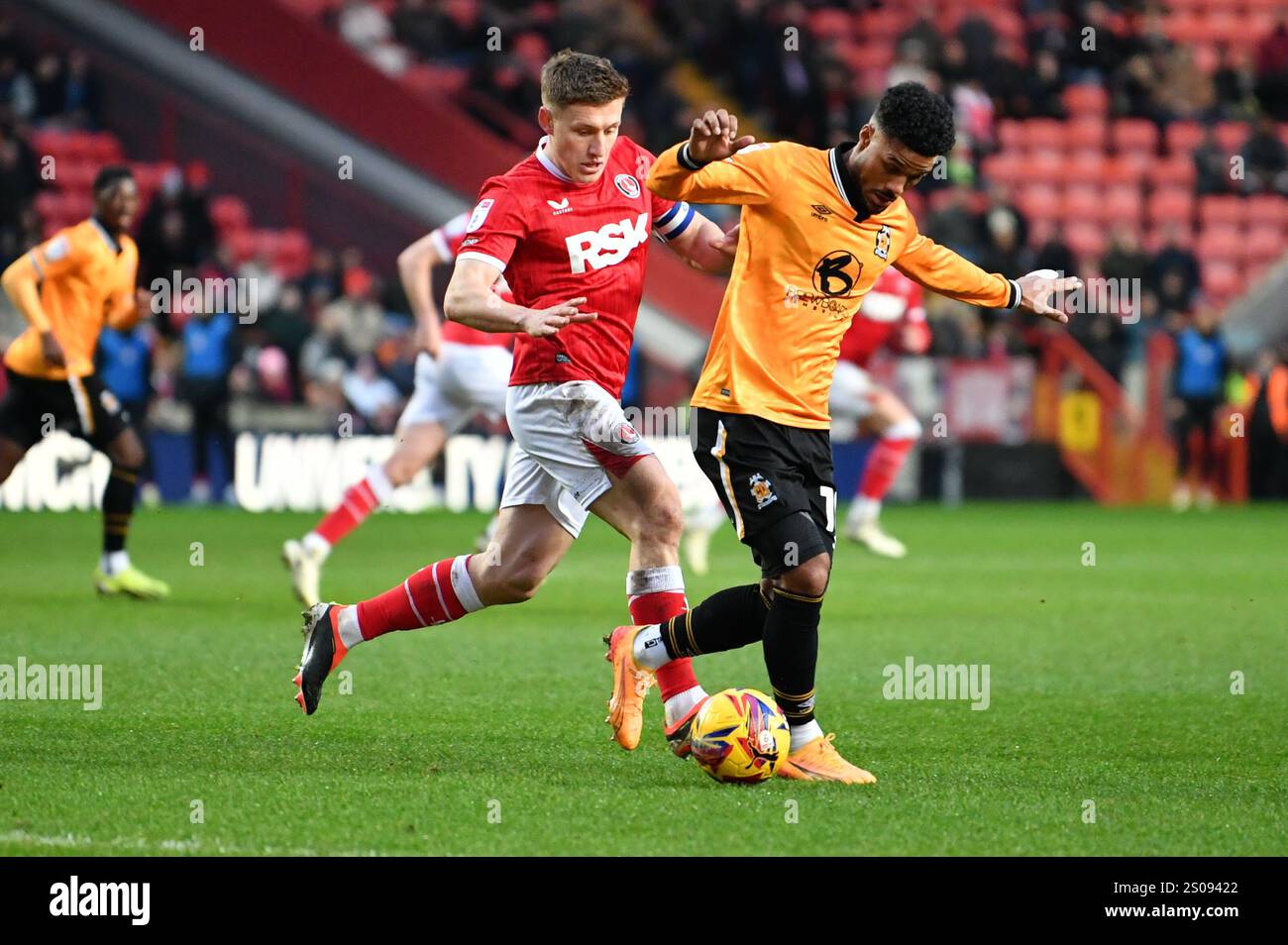 London, England. 26th Dec 2024. Elias Kachunga and Greg Docherty during ...