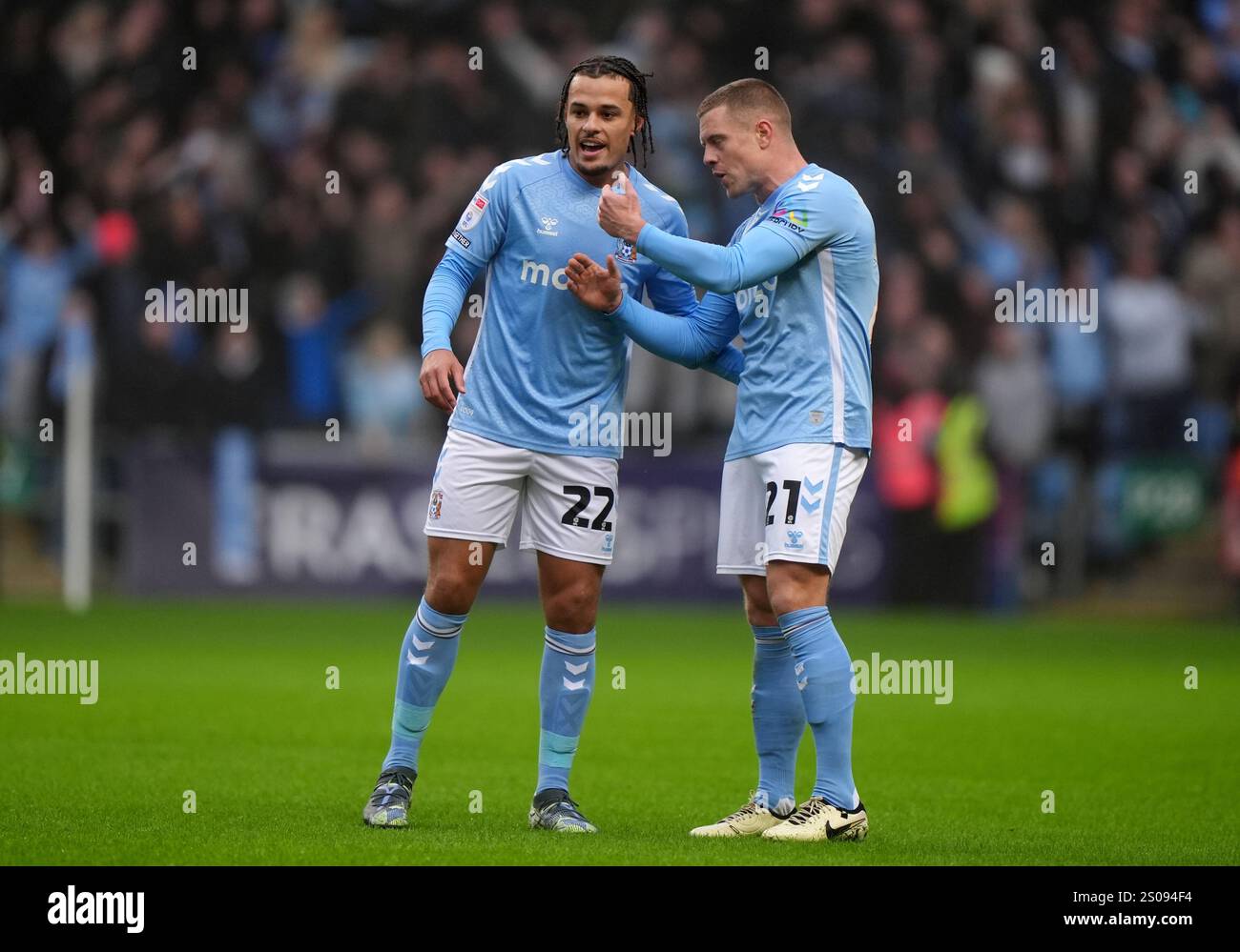 Coventry City's Joel Latibeaudiere (left) and Jake Bidwell during the ...