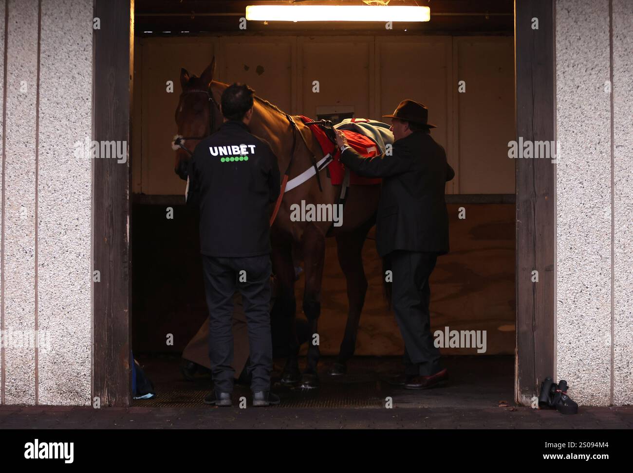 Trainer Nicky Henderson with horse East India Express in the stables ...