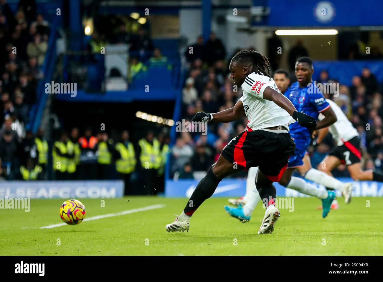 Calvin Bassey of Fulham shoots during the Premier League match Chelsea ...
