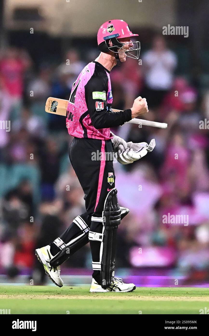 Jordan Silk of Sydney Sixers reacts after hitting the winning runs to ...