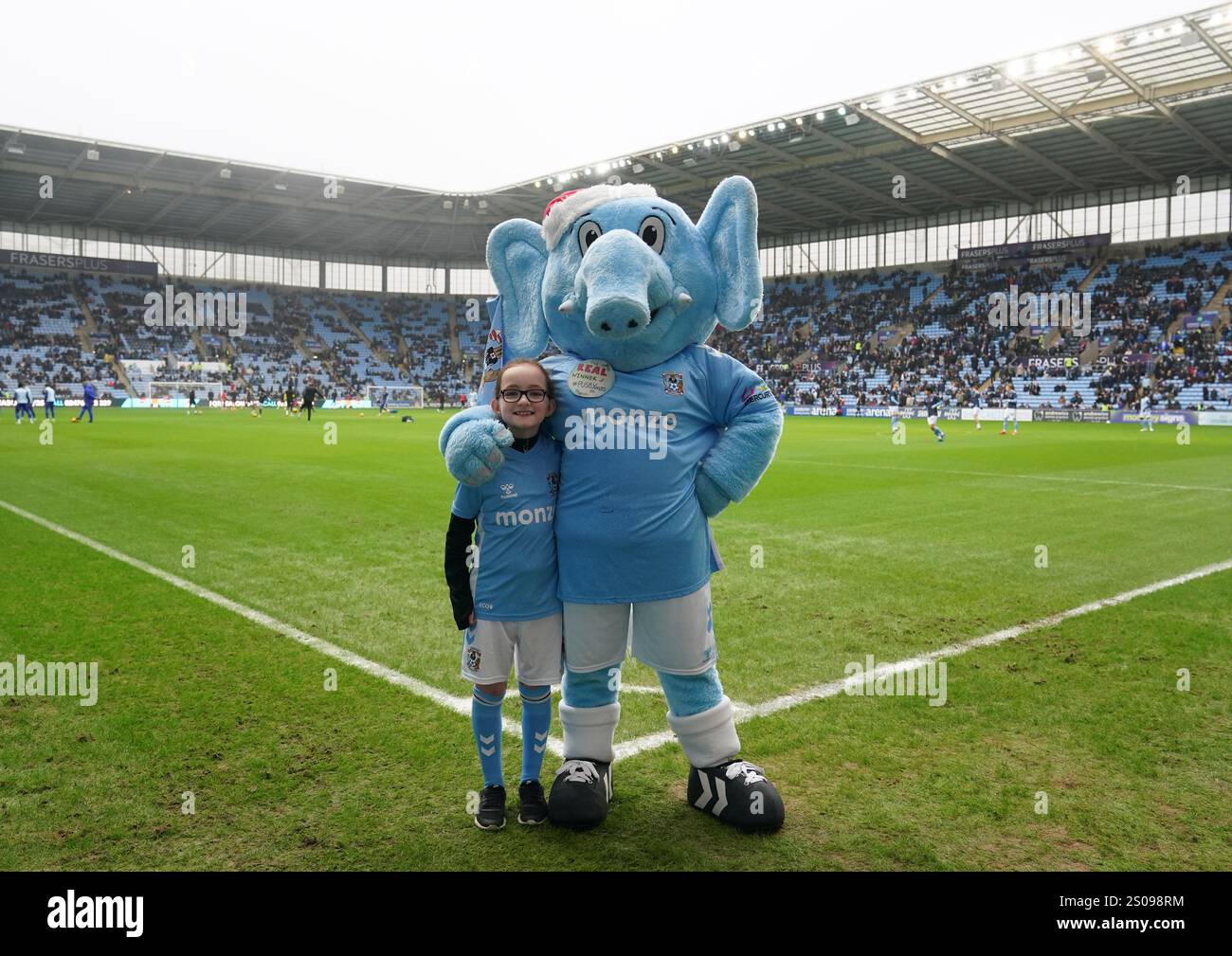 Coventry City mascot Sam with one of the Coventry City match day mascot ...