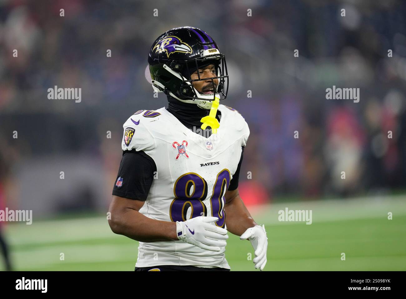 Baltimore Ravens tight end Isaiah Likely runs to the sideline during an ...