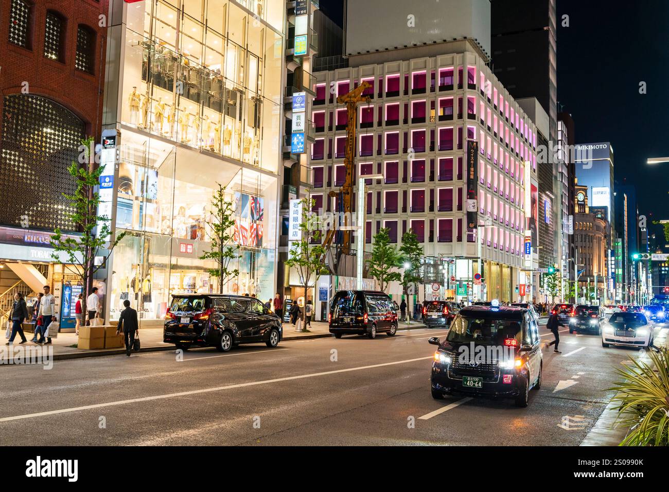 The Uni Qlo store with the purple illuminated Exitmelsa shopping centre ...
