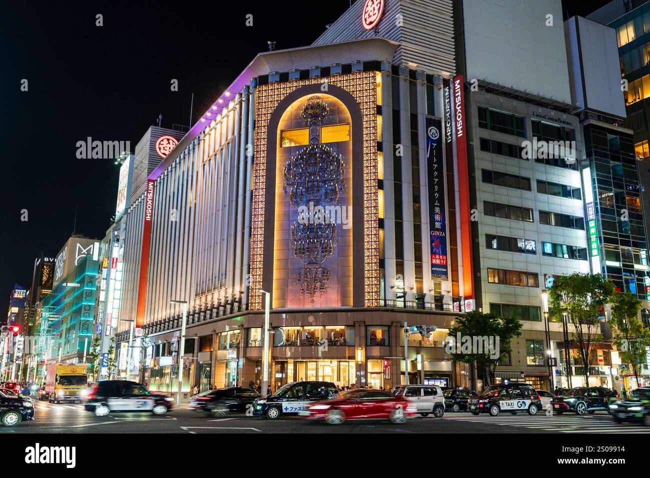 The landmark iconic Mitsukoshi Department store building at night. In ...