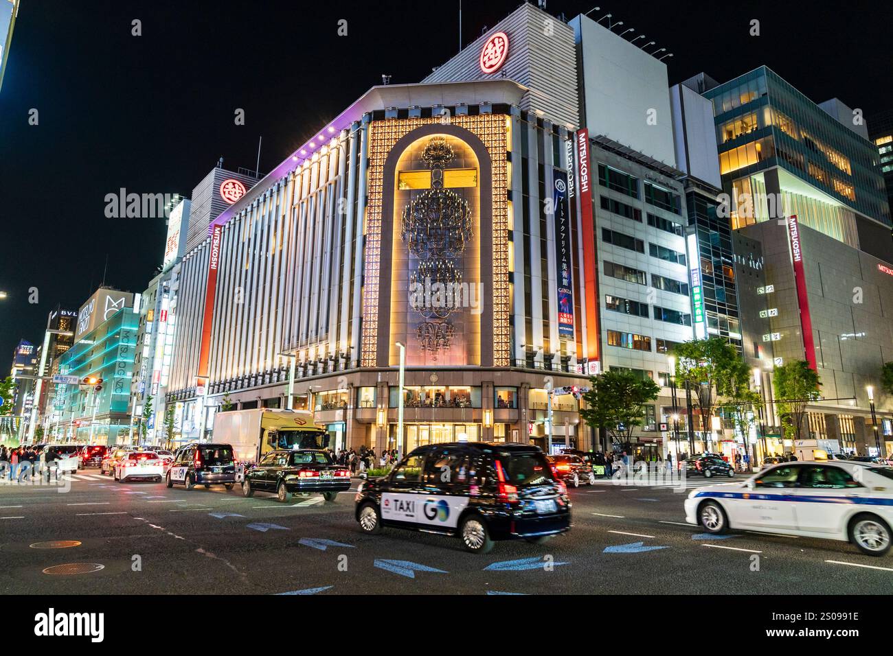 The landmark iconic Mitsukoshi Department store building at night. In ...