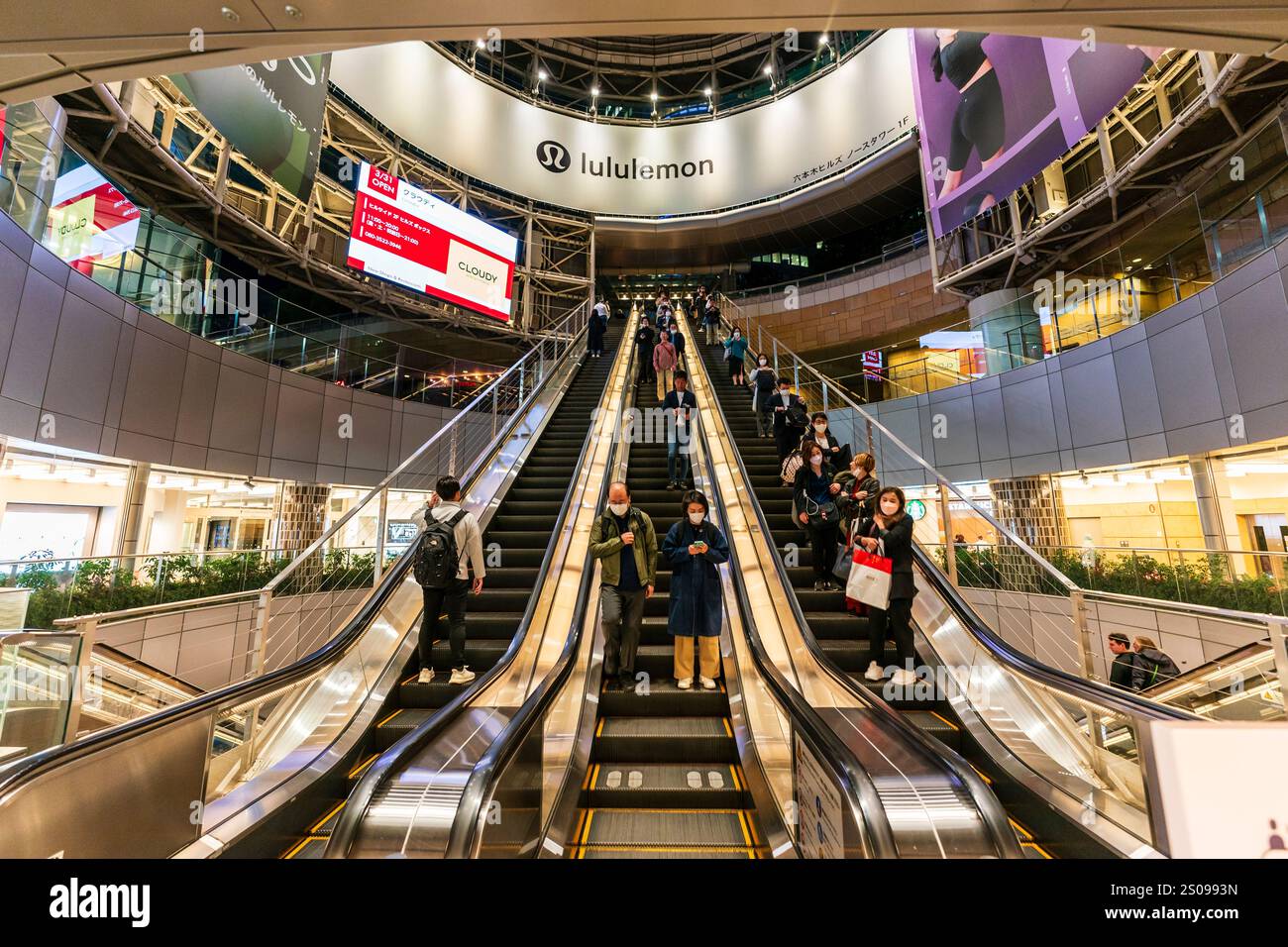 Interior of the Metro Hat building, showing the escalators going to the ...