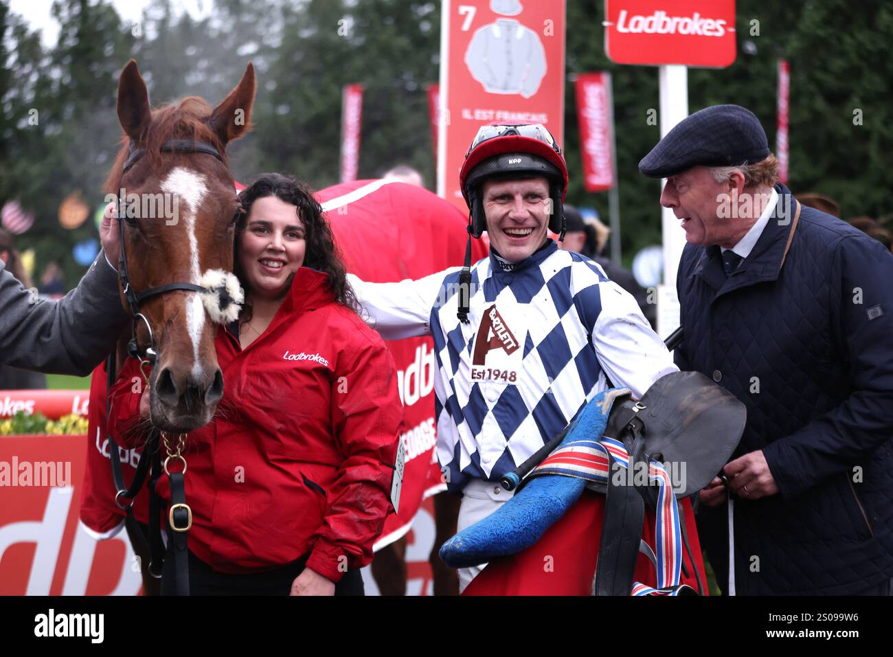 Jockey Paul Townend (centre) after victory in the Ladbrokes King George ...