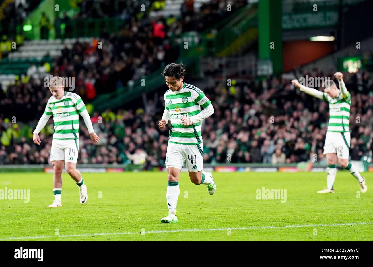 Celtic's Reo Hatate celebrates scoring their side's fourth goal of the ...