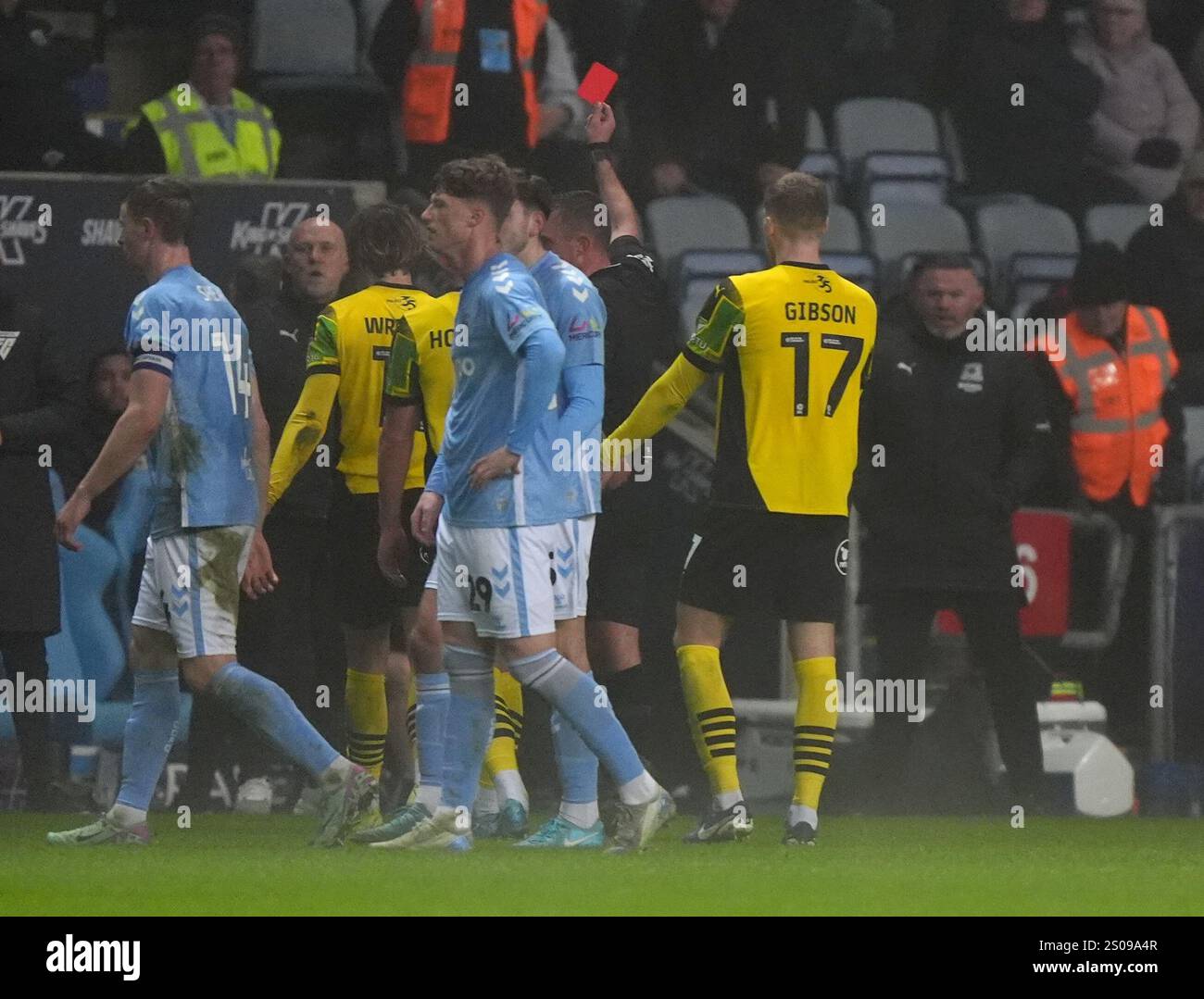 Referee Adam Herczeg shows Plymouth Argyle's Callum Wright (second left ...
