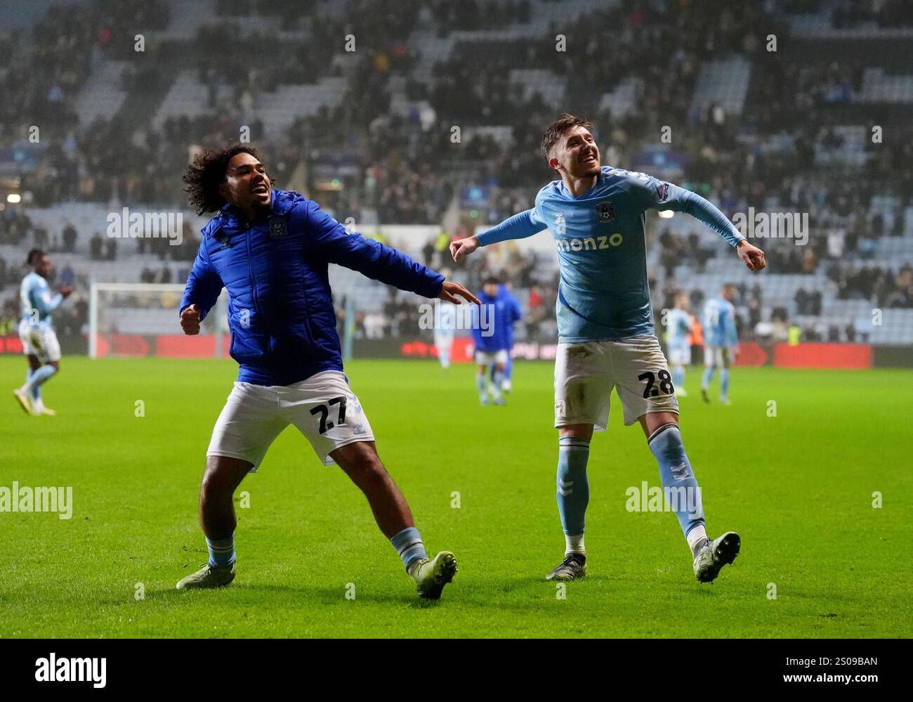 Coventry City's Milan van Ewijk (left) and Coventry City's Josh Eccles ...