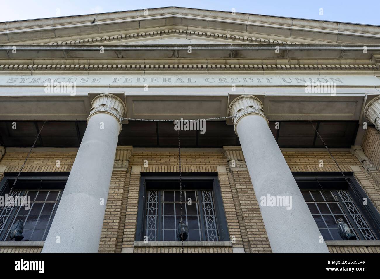 The classical facade of the old Syracuse Federal Credit Union building ...