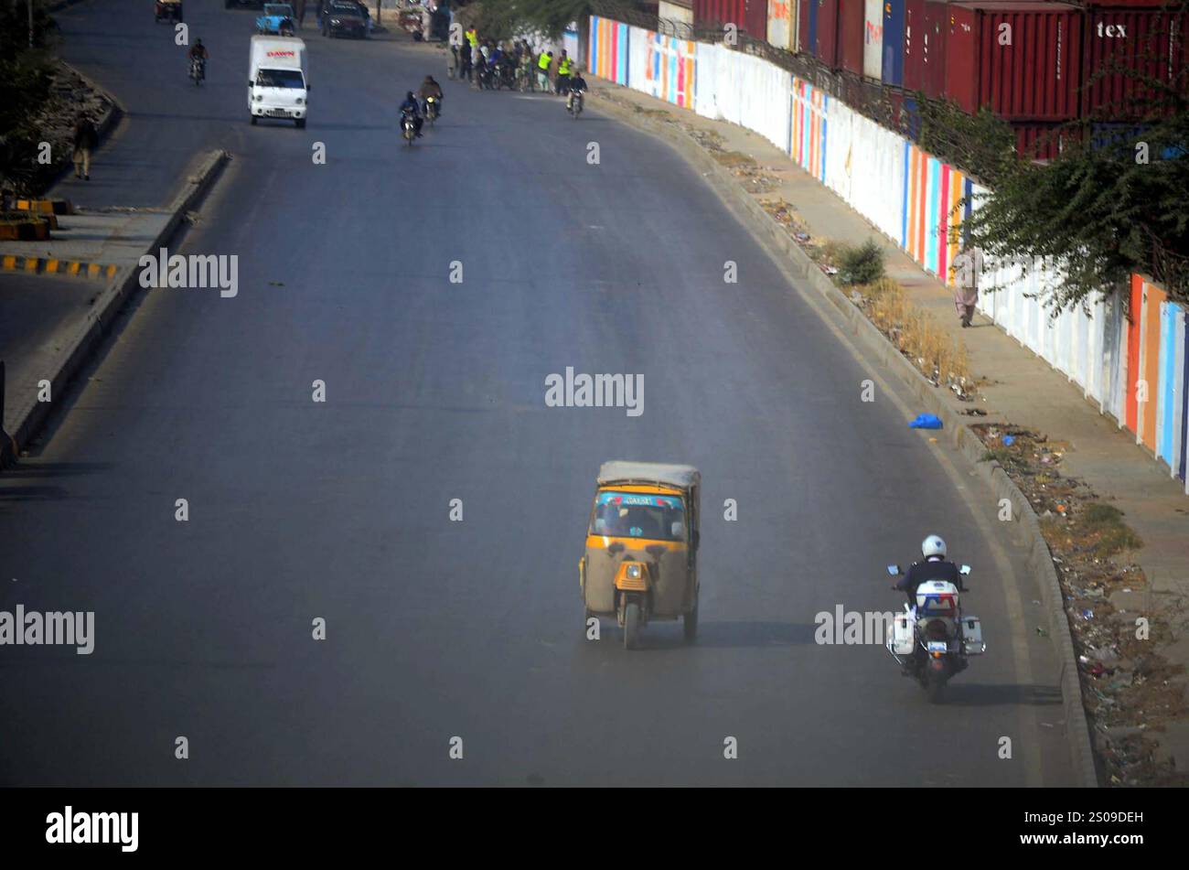 Traffic Police motorcyclist passes through wrong side of road violates ...