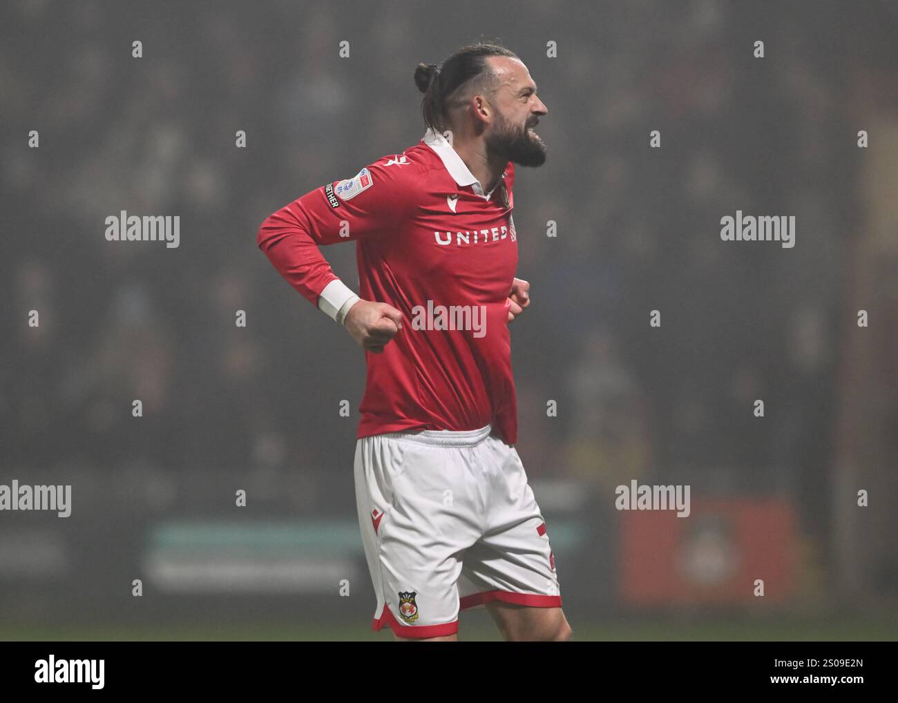 Wrexham's Steven Fletcher celebrates scoring their side's second goal ...