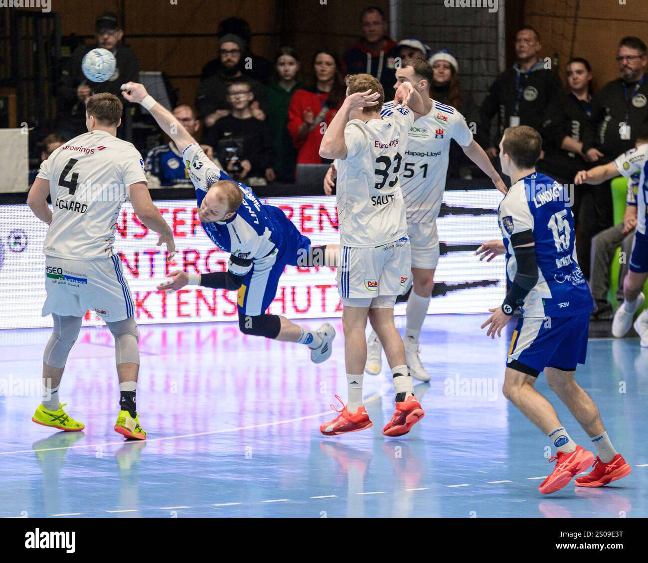 Eisenach, Deutschland. 26th Dec, 2024. Peter Walz (ThSV Eisenach, #14), Moritz Sauter (Rueckraum ...