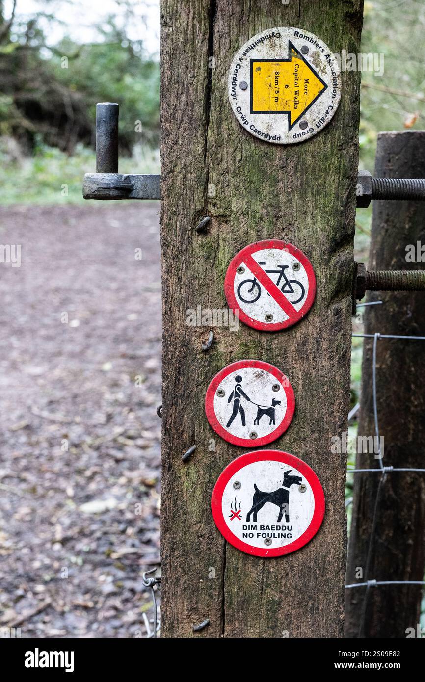 Bilingual Welsh and English footpath signs for dogs, bikes and walkers ...