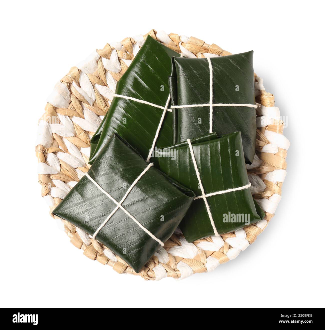 Cut banana leaves with food isolated on white, top view. Healthy eco ...