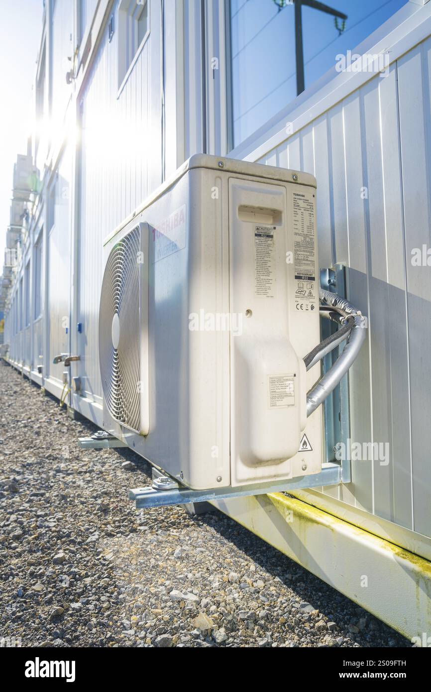 Technical close-up of an air conditioning system on a container wall ...