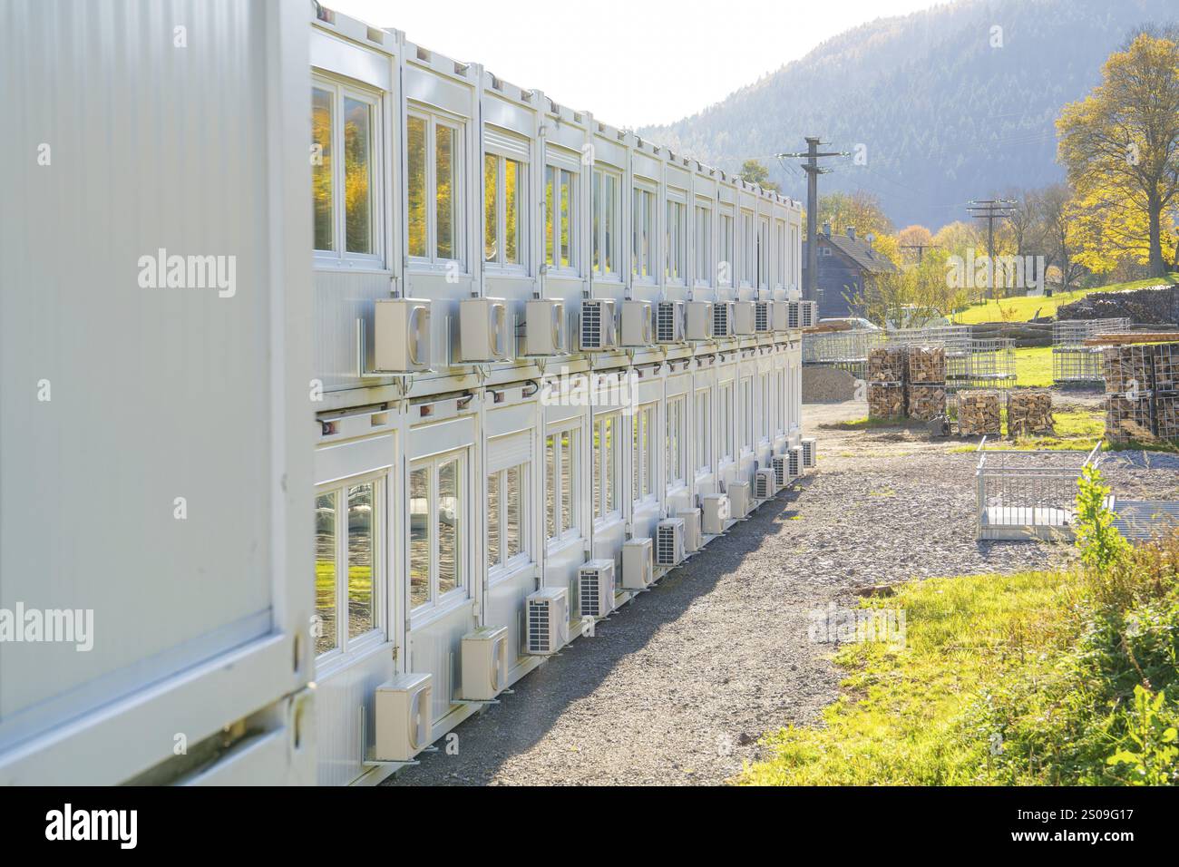 Rows of containers with air coolers in a sunny landscape, Beermiss ...