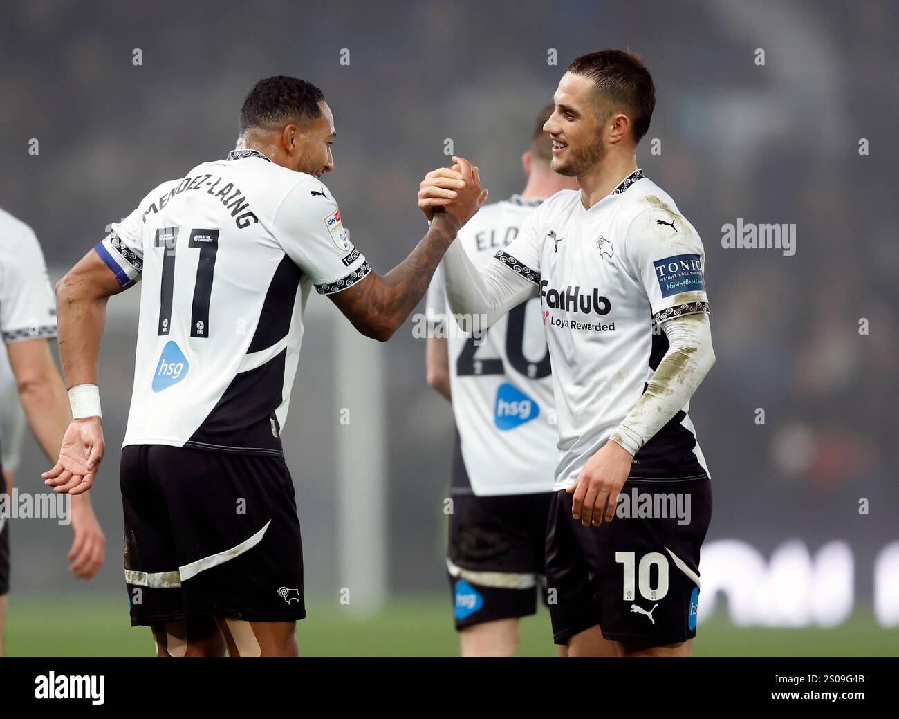 Derby County's Jerry Yates celebrates scoring their side's first goal ...
