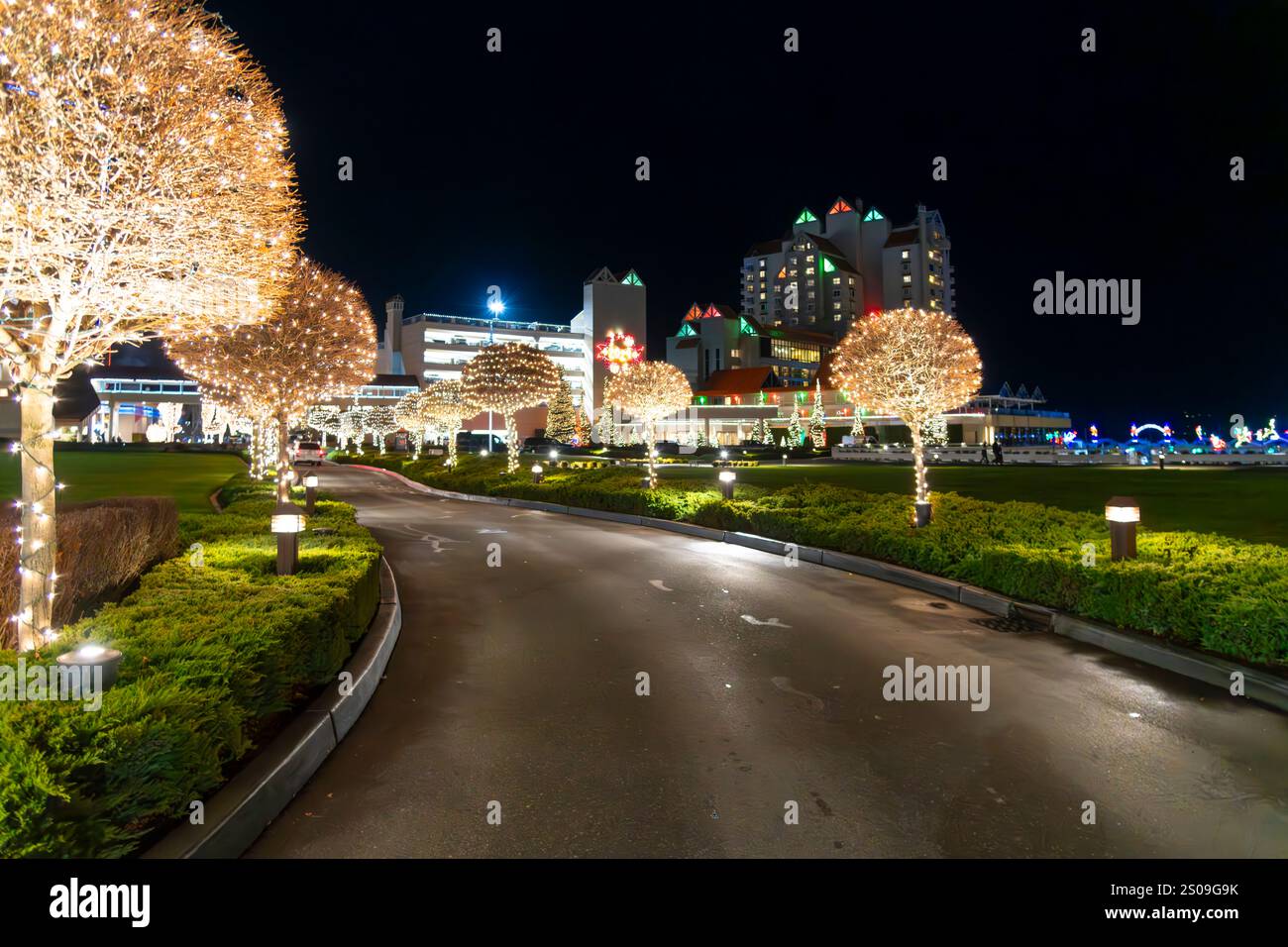 The illuminated lakefront downtown resort with colorful Christmas ...