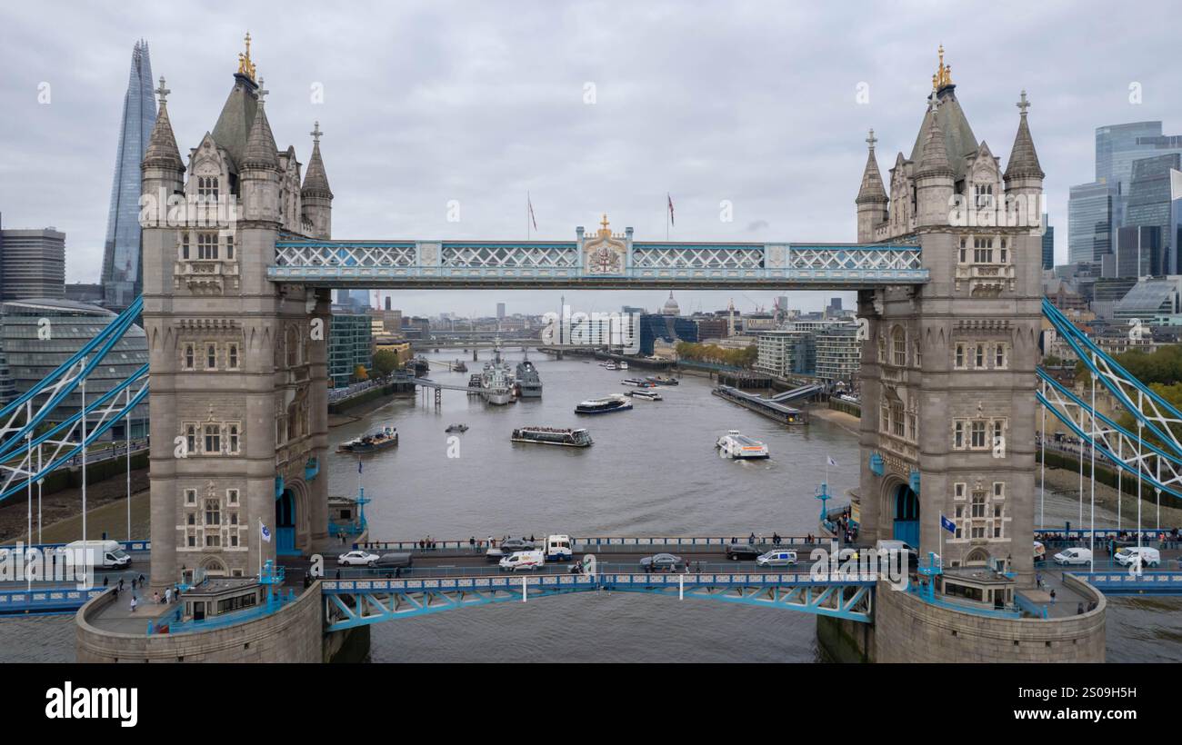 Aerial pullback shot of Tower Bridge's traffic jam revealing a ...
