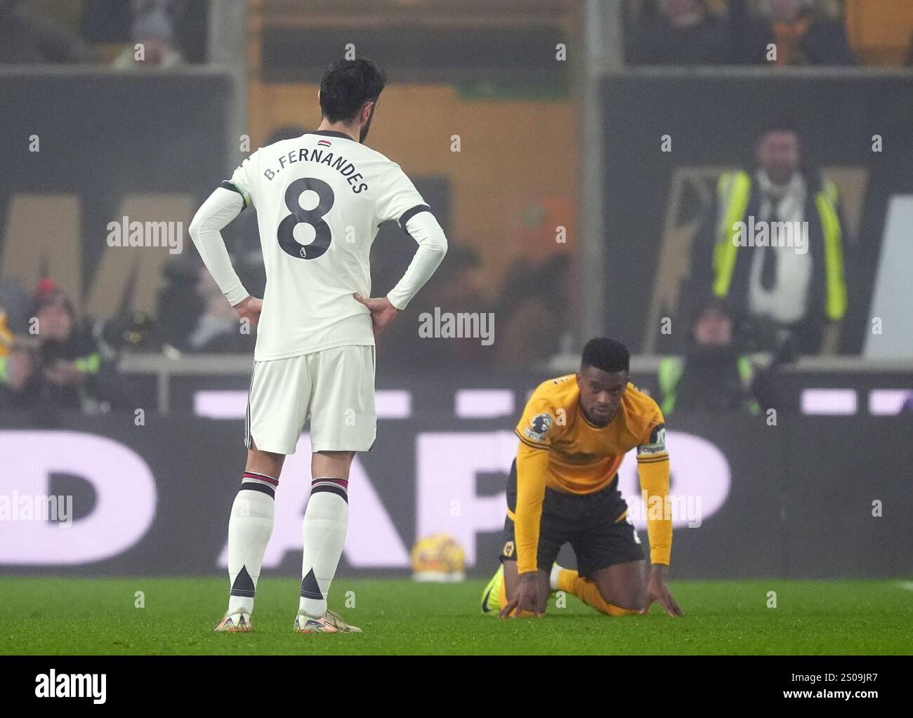 Manchester United's Bruno Fernandes stands dejected after being sent ...