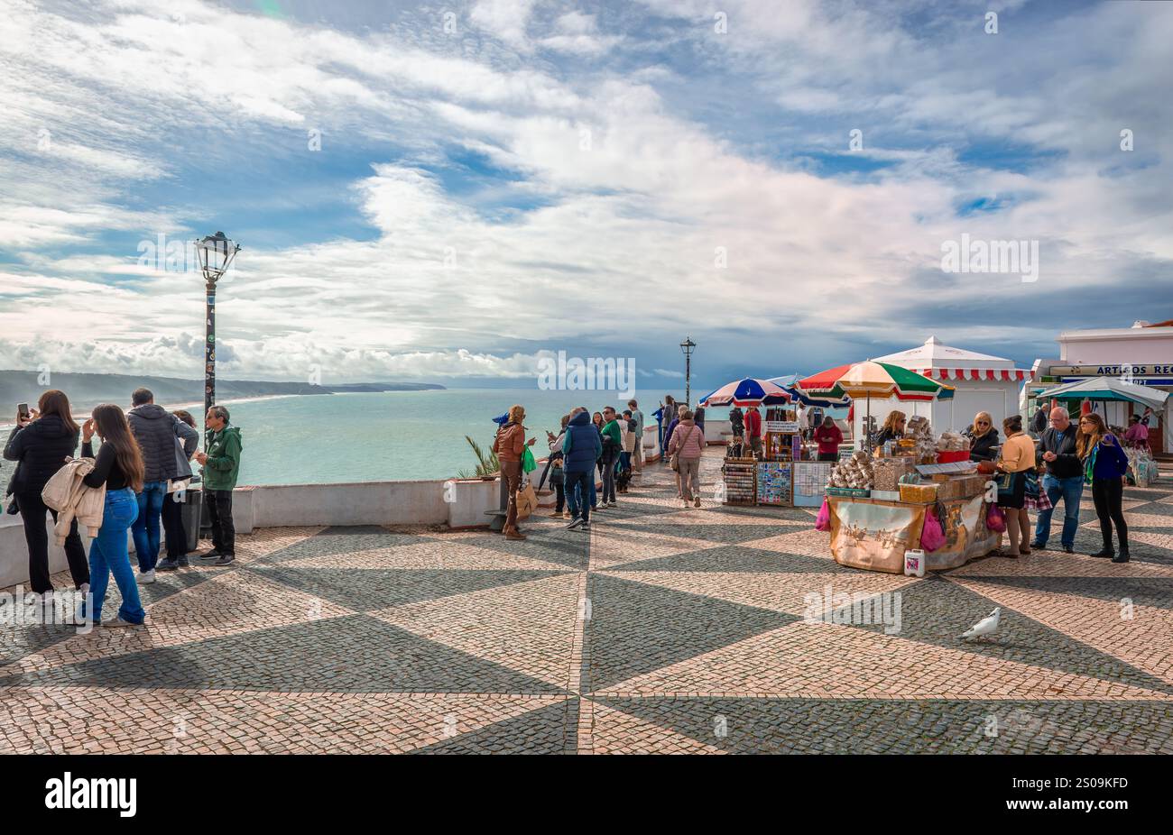 Nazare, Portugal - October 26 2024: People at the square of Sitio, atop ...