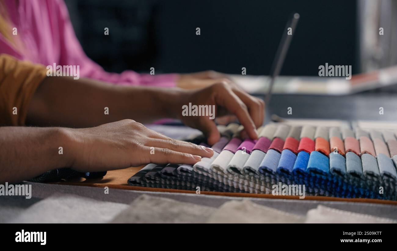 Male female hands touch choose color fabric samples collaborate fashion ...