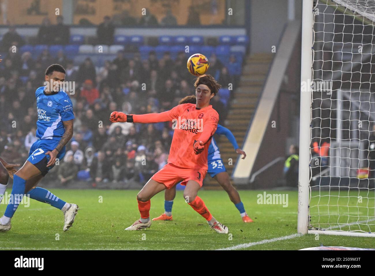 Goalkeeper Nicholas Bilokapic (1 Peterborough) stops the ball during ...