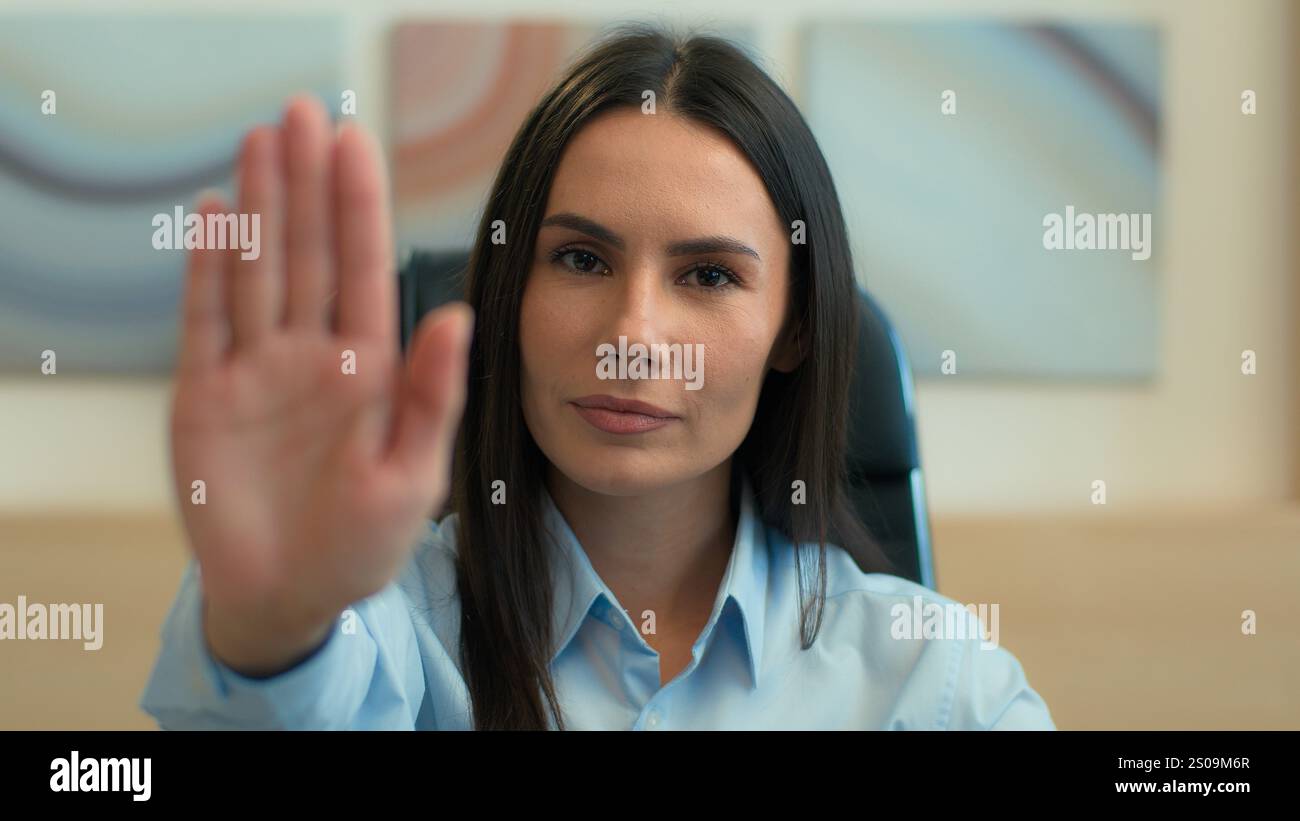 Business portrait indoors Caucasian serious strong woman business girl ...