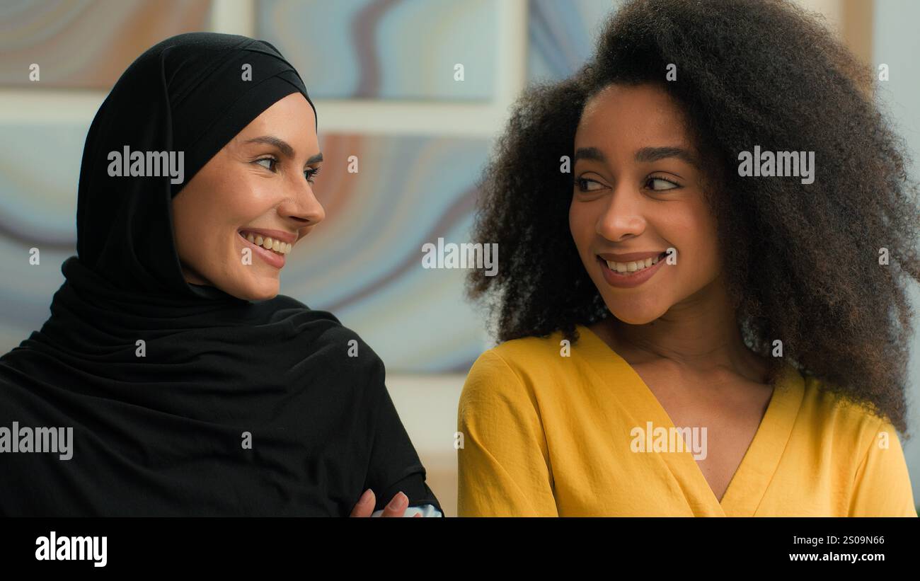 Two joyful women smiling hi-res stock photography and images - Alamy
