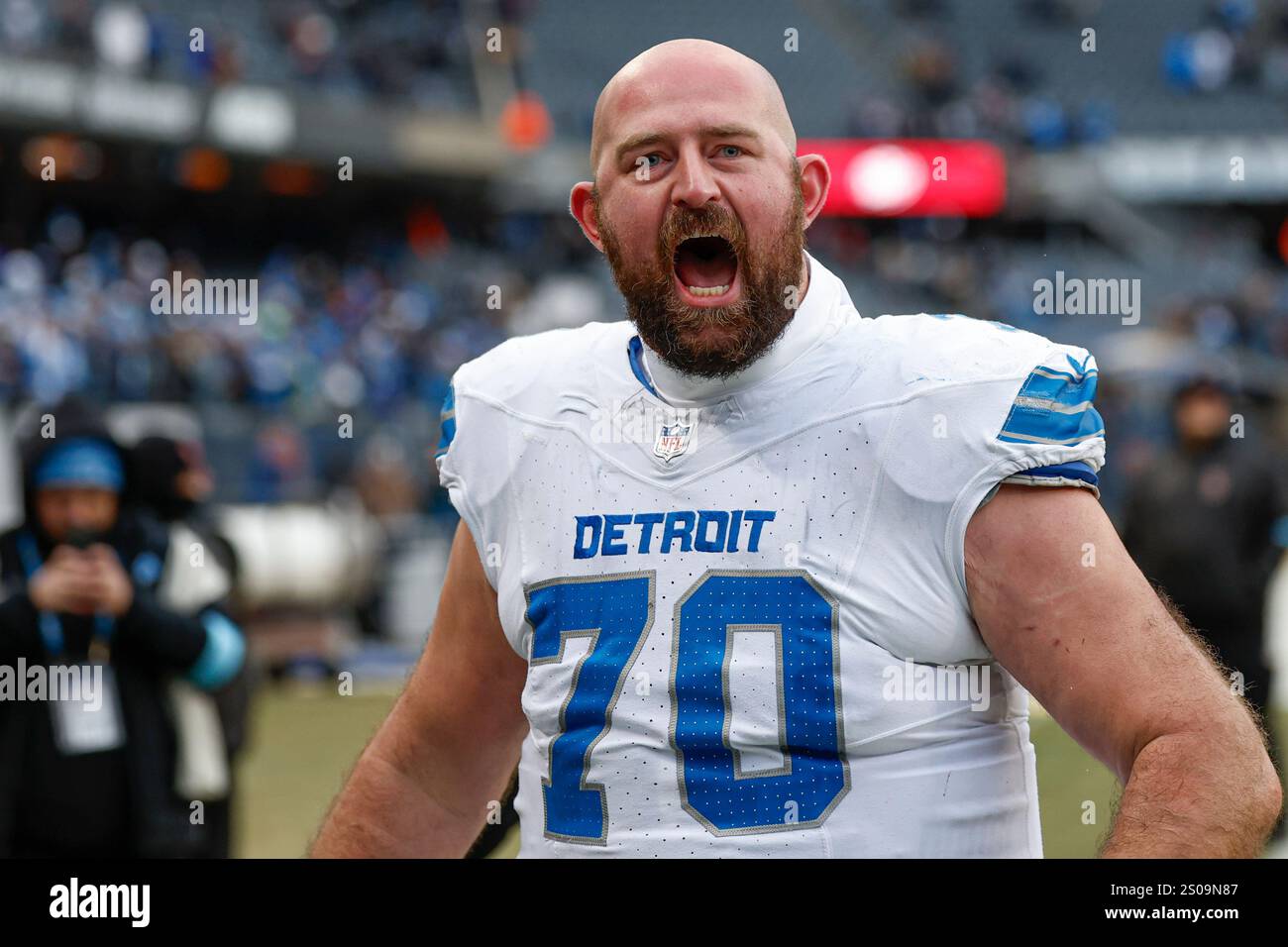 Detroit Lions offensive tackle Dan Skipper (70) celebrates as he walks ...