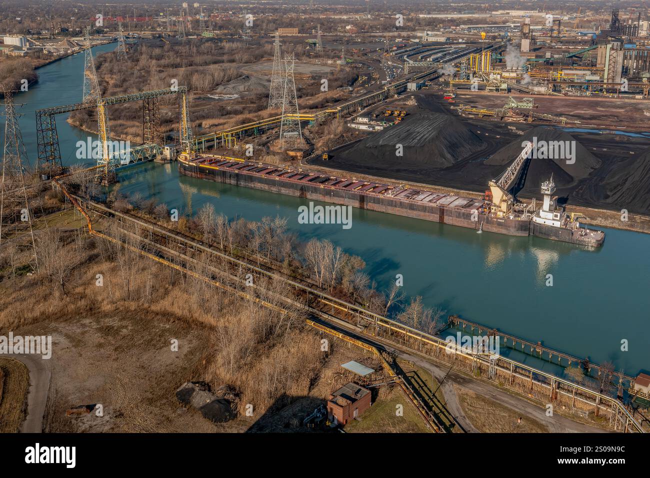 Barge offloading coal to Zug Island on the Rouge River, Michigan, USA ...