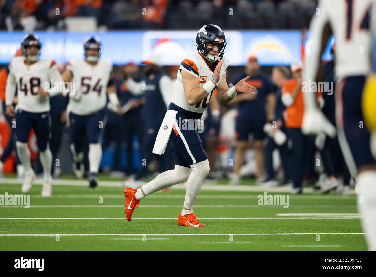 Denver Broncos quarterback Bo Nix (10) reacts during an NFL football ...