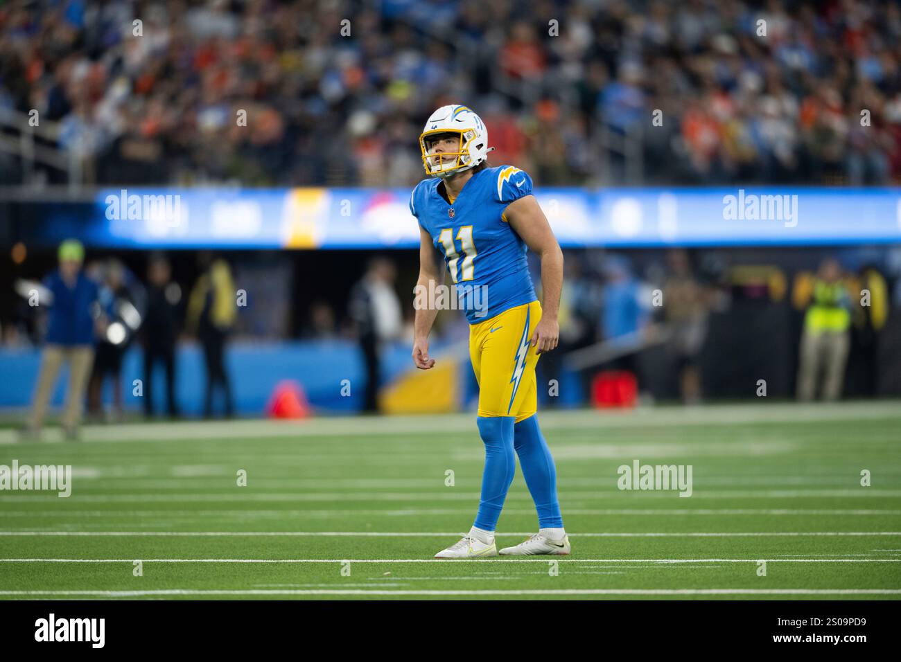 Los Angeles Chargers place kicker Cameron Dicker (11) looks to kick for ...