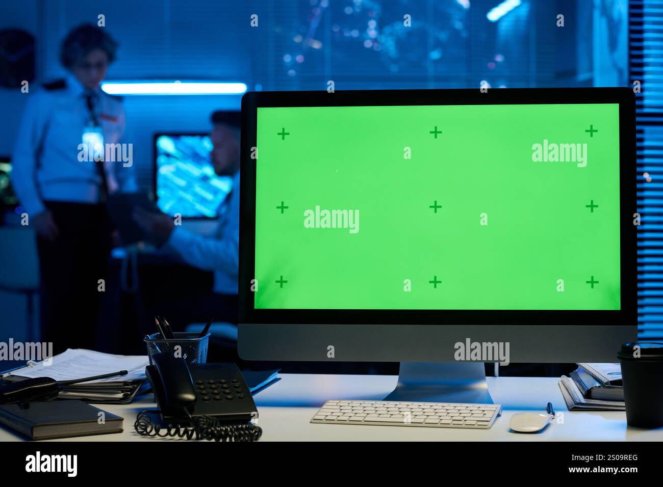 Blank chromakey screen of desktop computer standing on workplace of ...