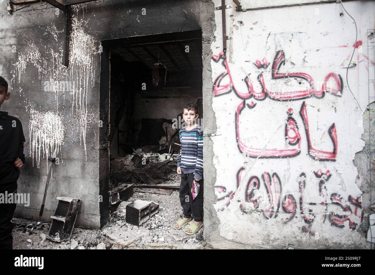 Tulkarm, Palestine. 26th Dec, 2024. Palestinian Fatima al-Saadi and her ...