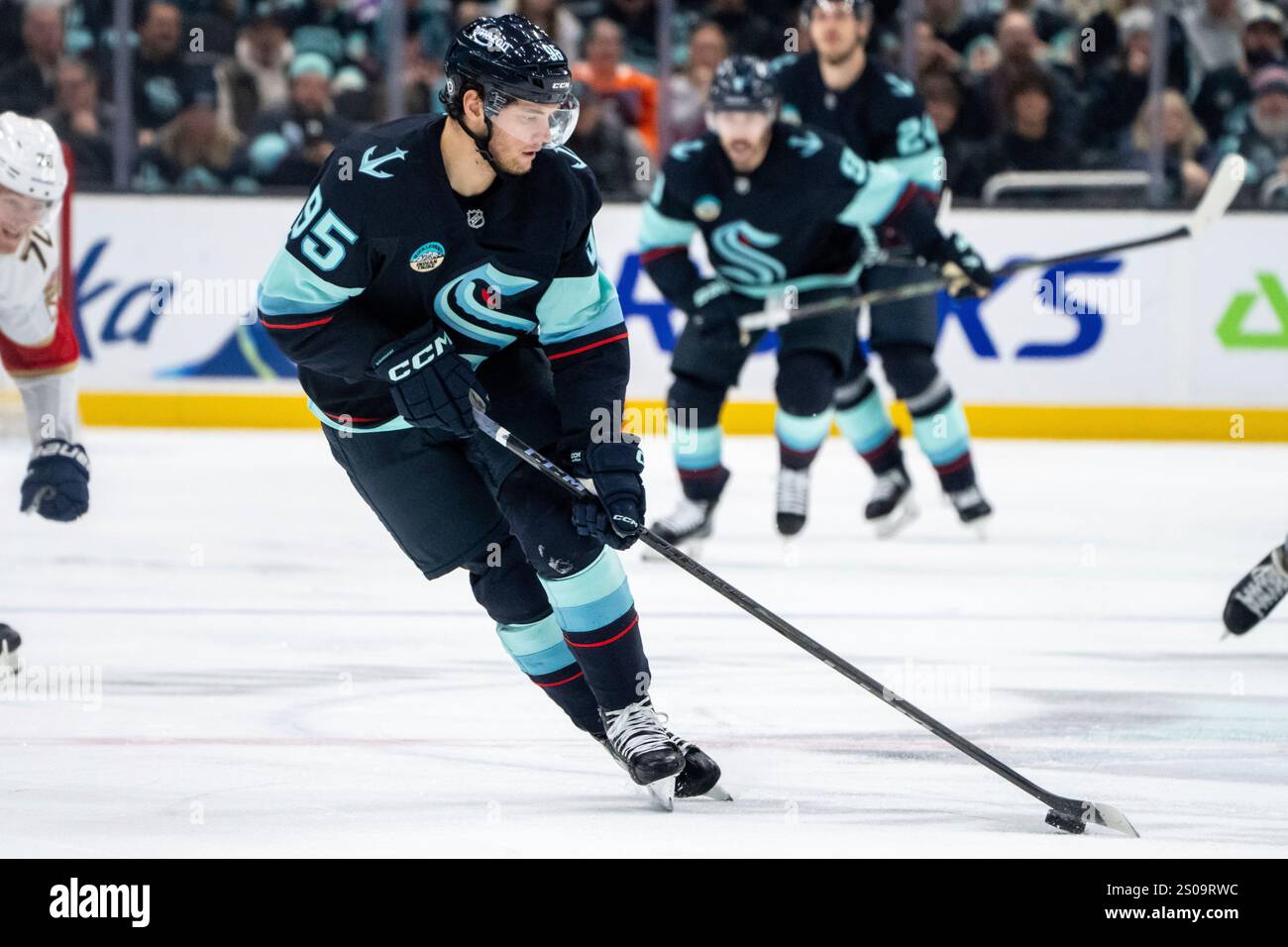 Seattle Kraken forward Andre Burakovsky skates with the puck during an ...