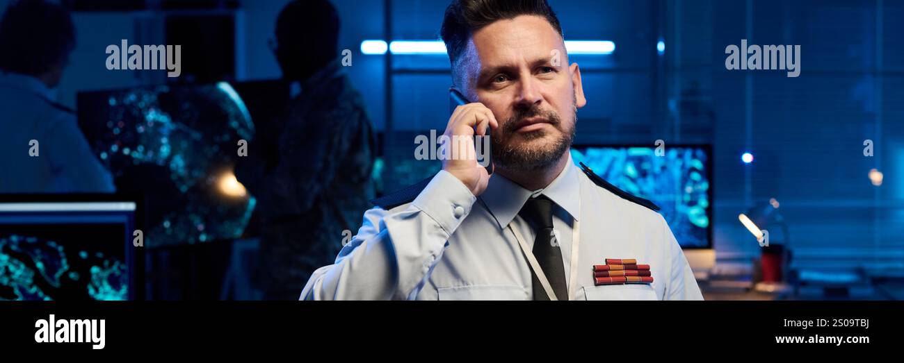 Header of confident mature male officer standing in front of camera in ...