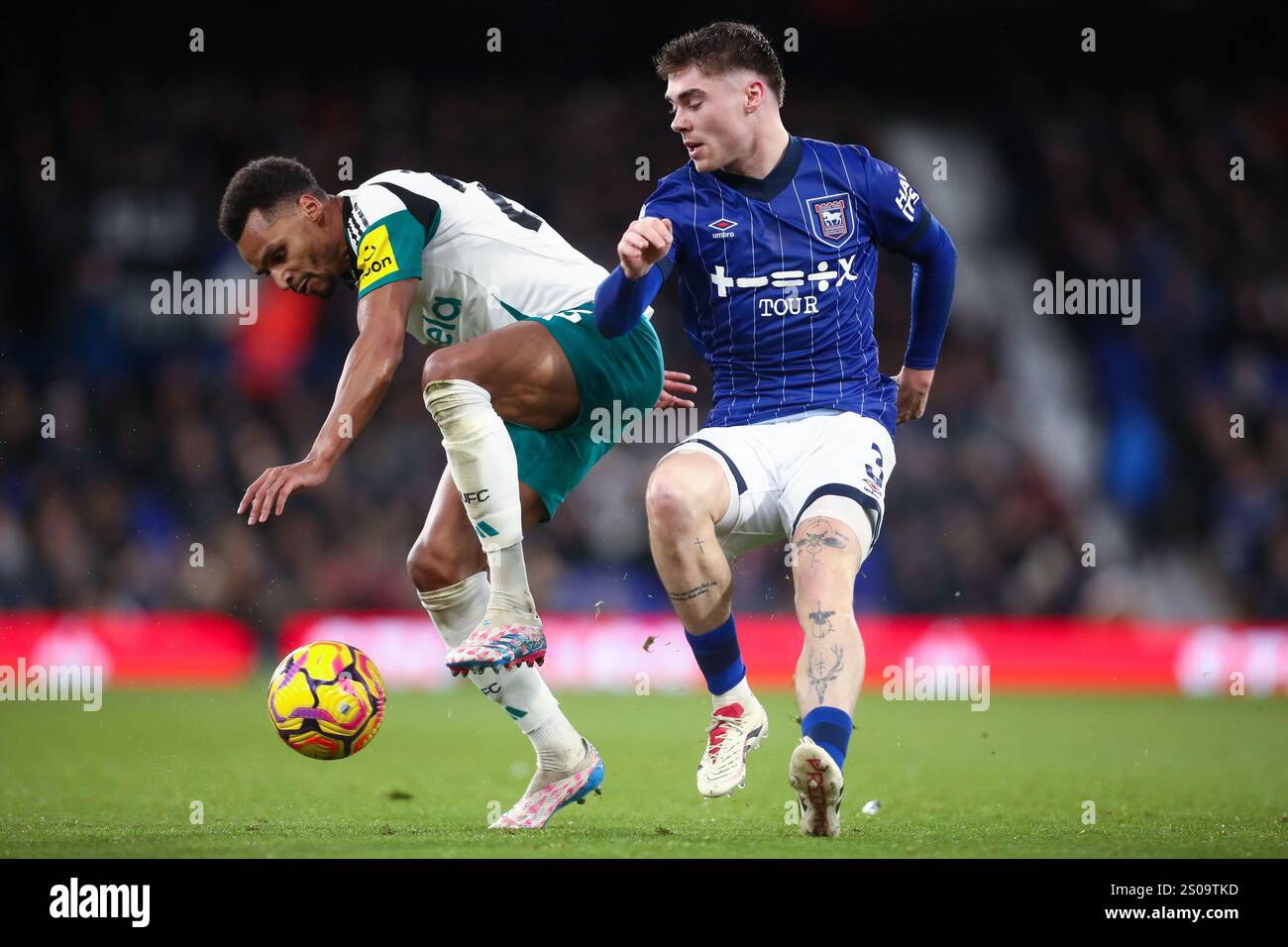 Jacob Murphy of Newcastle United and Leif Davis of Ipswich Town ...