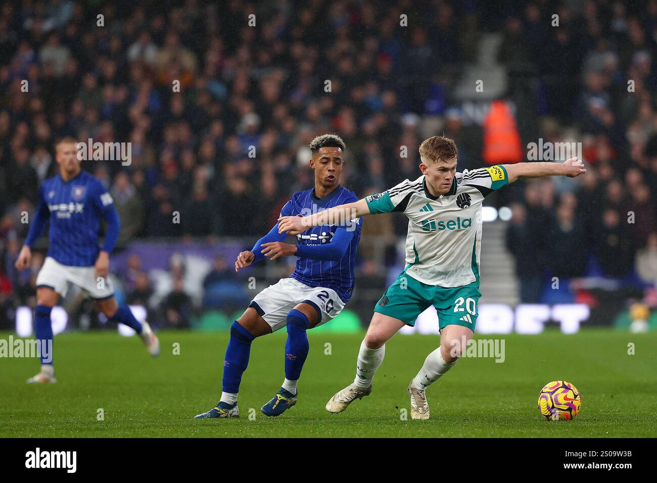 Lewis Hall of Newcastle United and Omari Hutchinson of Ipswich Town ...