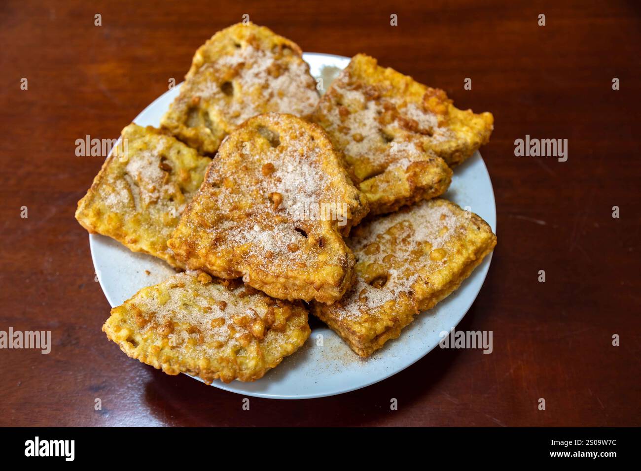 Traditional sweet Christmas French toast served with cinnamon sugar in ...