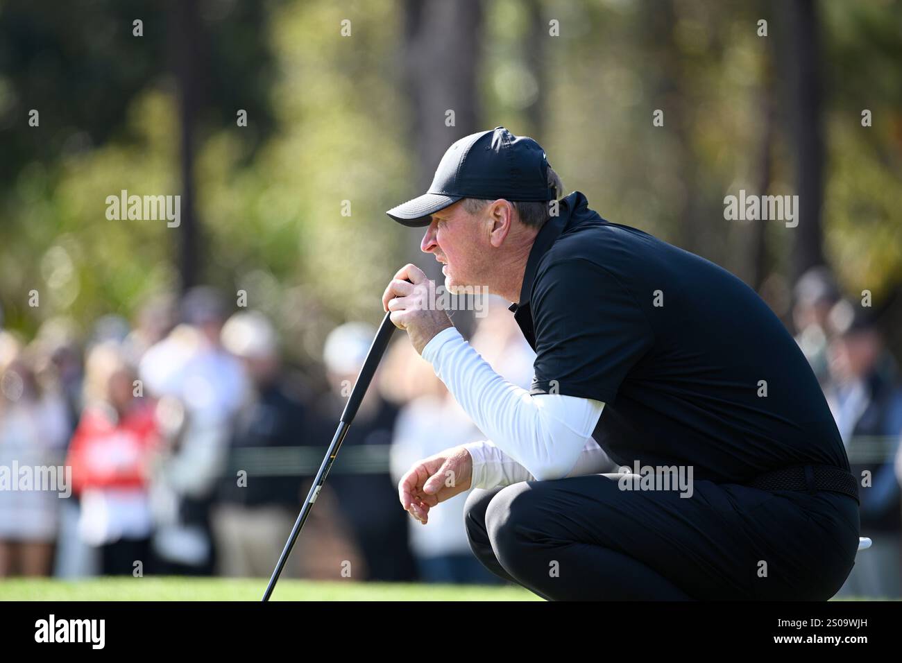 Petr Korda lines up a putt on the third green during the first round of ...