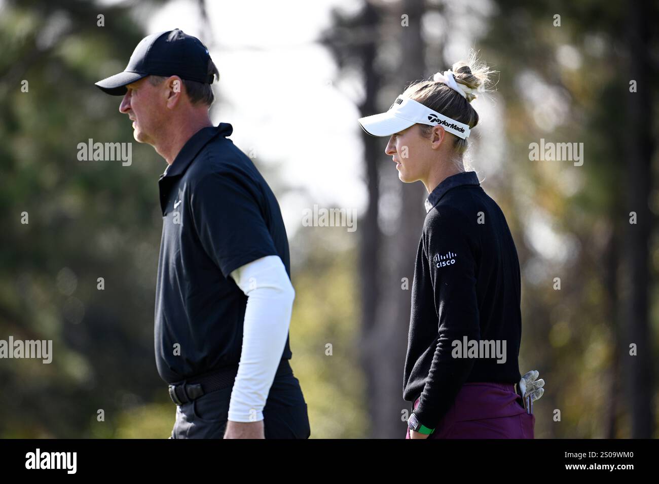 Nelly Korda, right, and her father Petr Korda line up a putt on the ...