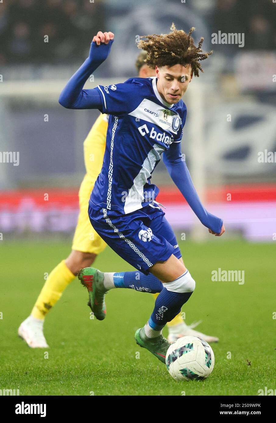 Gent, Belgium. 26th Dec, 2024. Gent's Franck Surdez fights for the ball ...