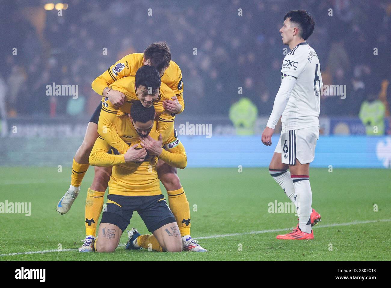 #11, Hwang Hee-Chan of Wolves (middle) celebrates his goal during the ...